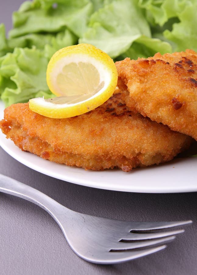 Plate of fried cordon blue stock photo. Image of lettuce - 21535636