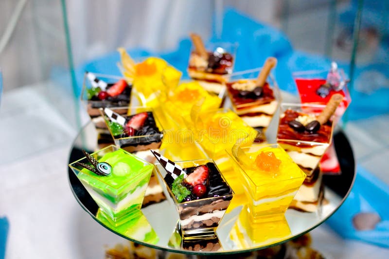 Plate of glass with cakes stock photo. Image of dessert - 45988614