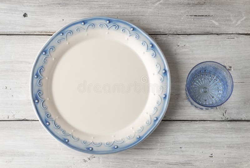 Plate and Glass on the White Wooden Table Top View Stock Photo - Image ...
