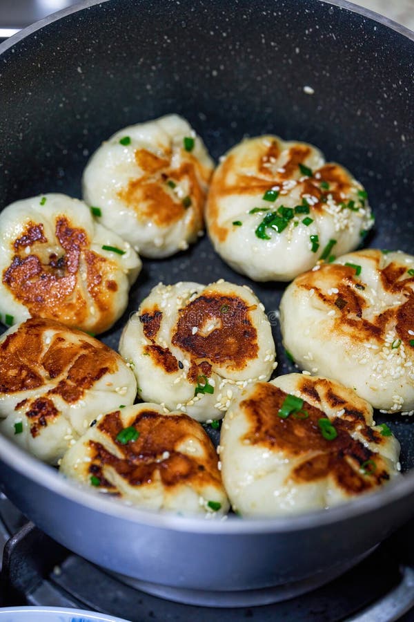 A Plate of Golden and Tempting Fresh Pork Fried Buns Stock Photo ...