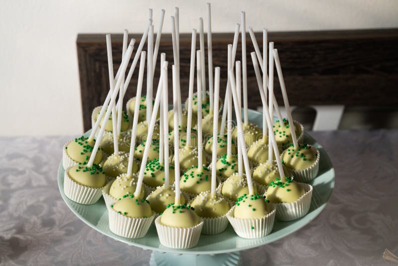 Plate of Green Cake Pops with Sprinkles on Them Stock Image - Image of ...