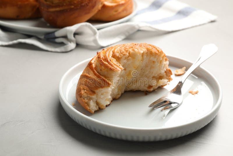 Plate with Half of Bun on Table Stock Image - Image of delicious, grey ...