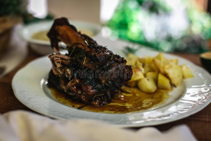 Plate of a Hot Delicious Baked Rack of Lamb and Potatoes Stock Photo ...