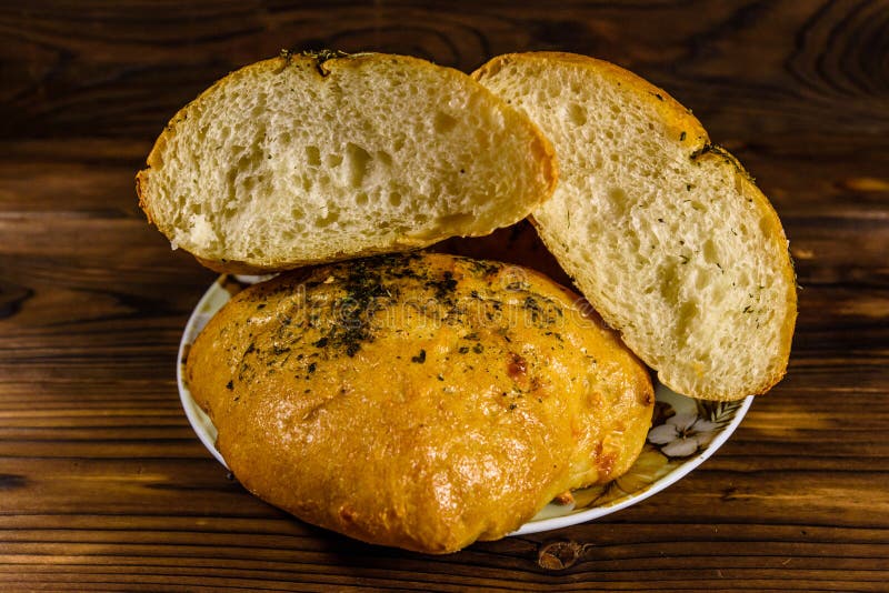 Plate with Italian Bun Ciabatta on Wooden Table Stock Image - Image of ...