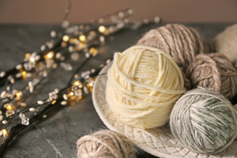 Plate with Knitting Yarn on Table, Closeup Stock Photo - Image of ...