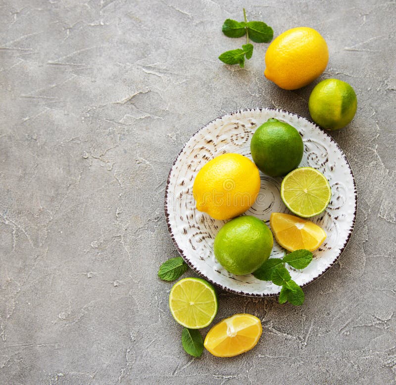 Plate with Lemons and Limes Stock Image - Image of citrus, sliced ...