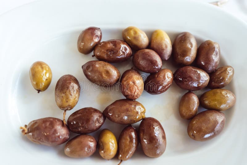 On the Plate Lie Large, Pickled Greek Olives. Stock Image - Image of ...