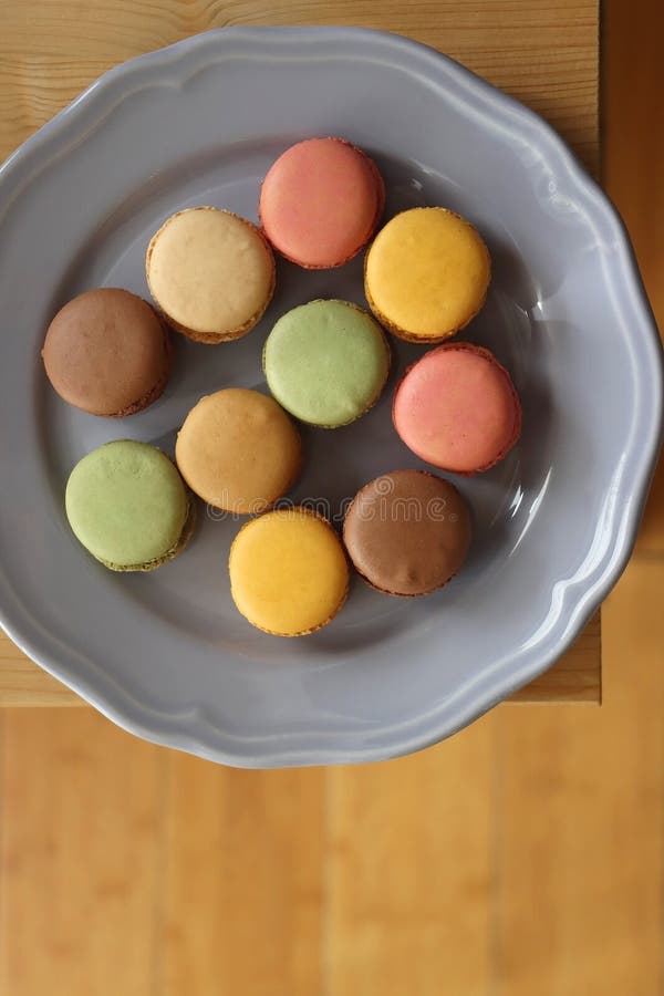 Plate of Macarons on Wooden Table Stock Image - Image of macaroon ...