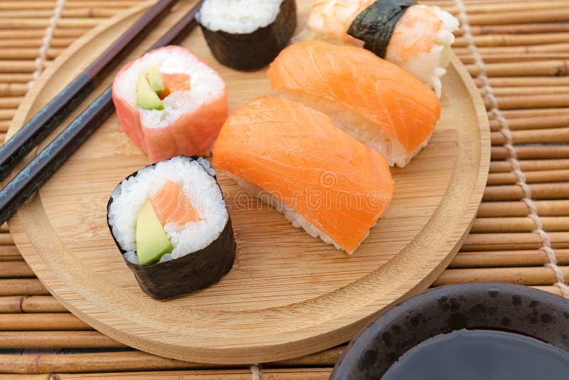 Plate of maki on a table stock image. Image of seafood - 217805475