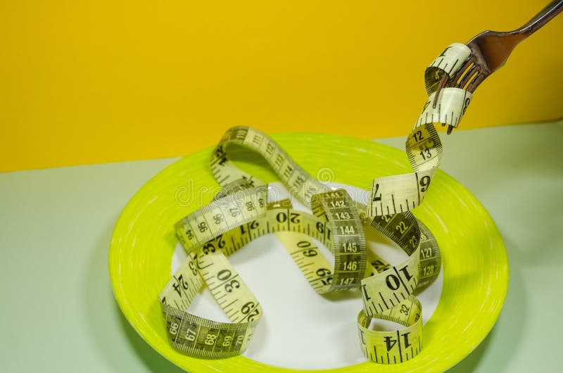 A Plate with Measuring Tape Stock Image - Image of conceptual, dieting ...