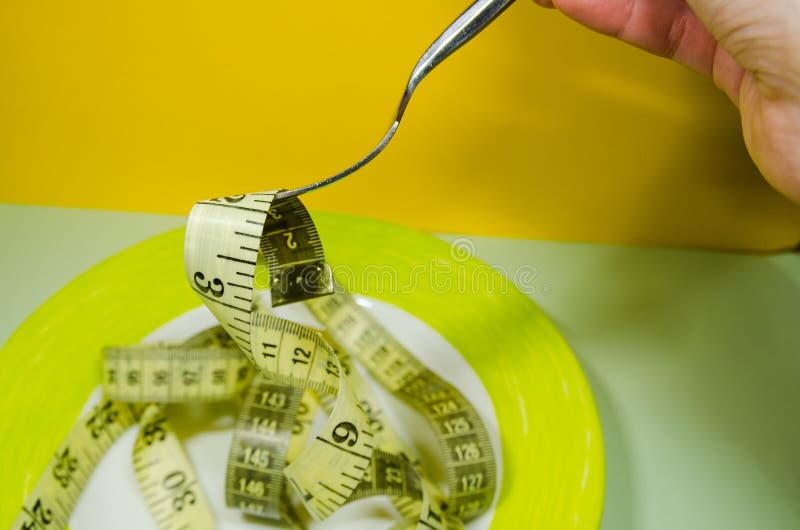 A Plate with Measuring Tape Stock Photo - Image of measure, blue: 145547798