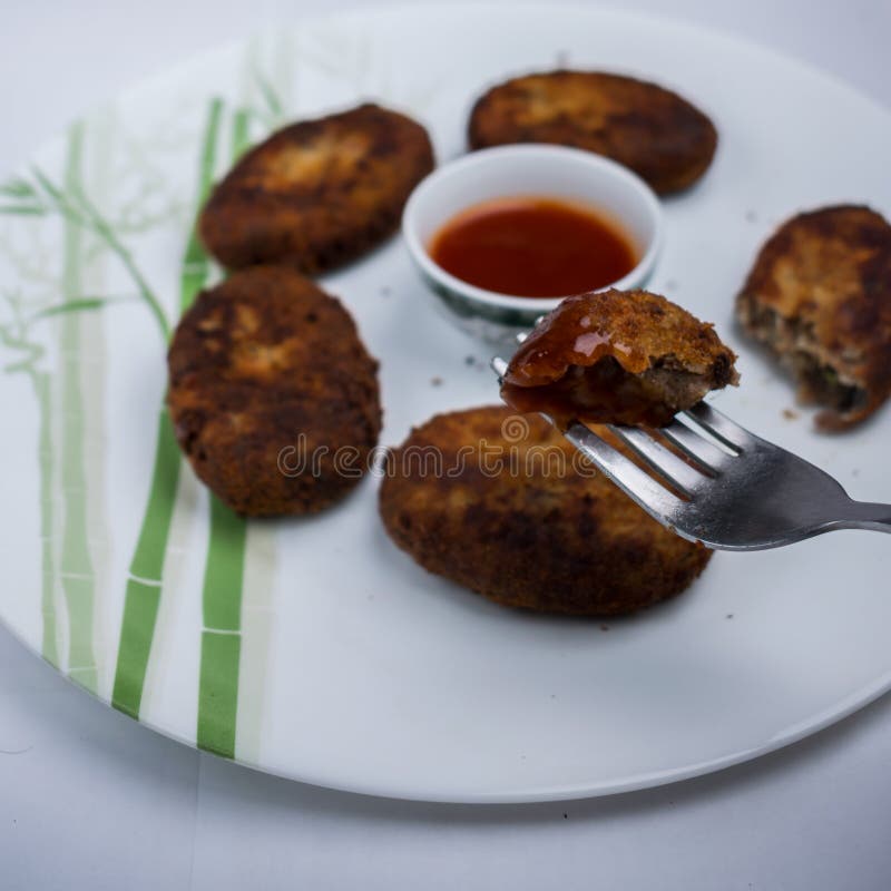 Meat cutlets on a plate stock photo. Image of piece - 116139190