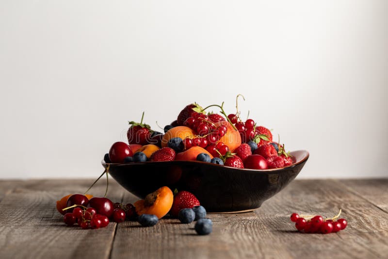 Plate with Mixed Delicious Berries on Stock Photo - Image of backdrop ...