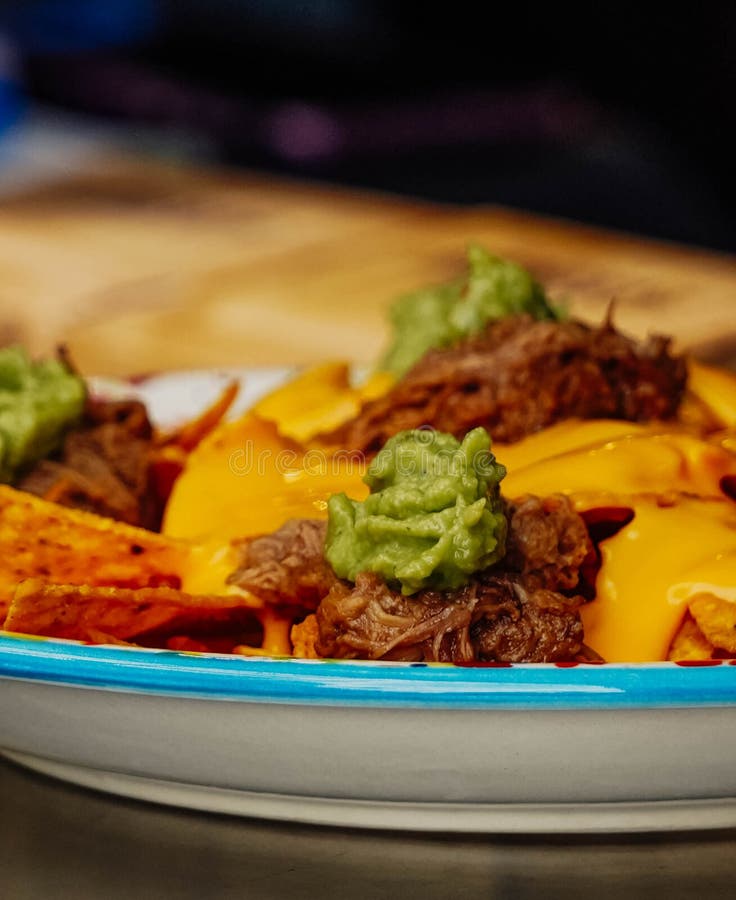 Plate of Nachos with Meat, Cheese and Guacamole Stock Image - Image of ...