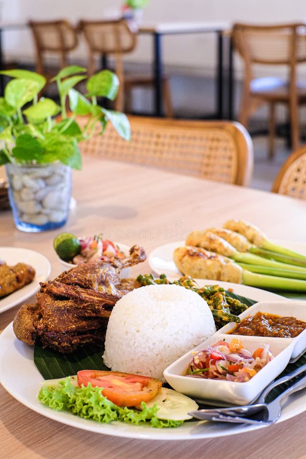 A Plate of Nasi Campur Bali Stock Photo - Image of omelet, delicious ...