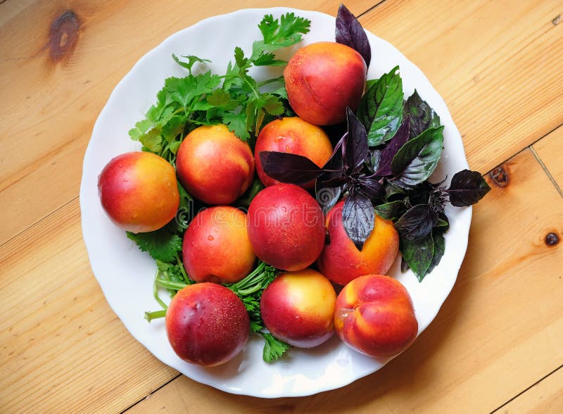 Plate with Nectarints Being on the Woody Table Stock Image - Image of ...