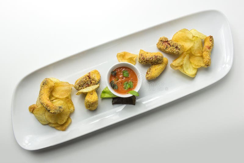 Plate with Octopus and Potato Chips Stock Image - Image of spicy, paper ...