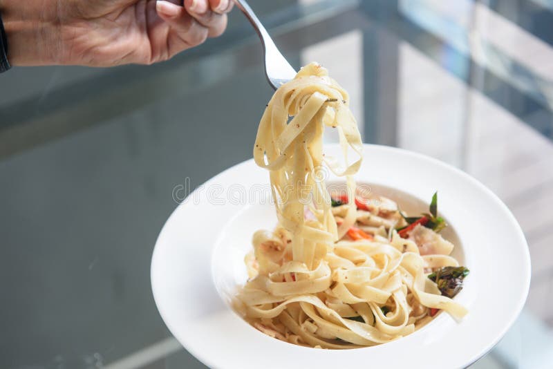 Plate of Pasta and Hand Man Stock Image - Image of fettuccine, healthy ...