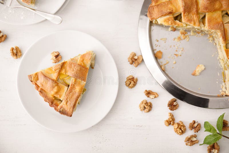 Plate with Piece of Delicious Apple Pie on Wooden Table, Top View Stock ...