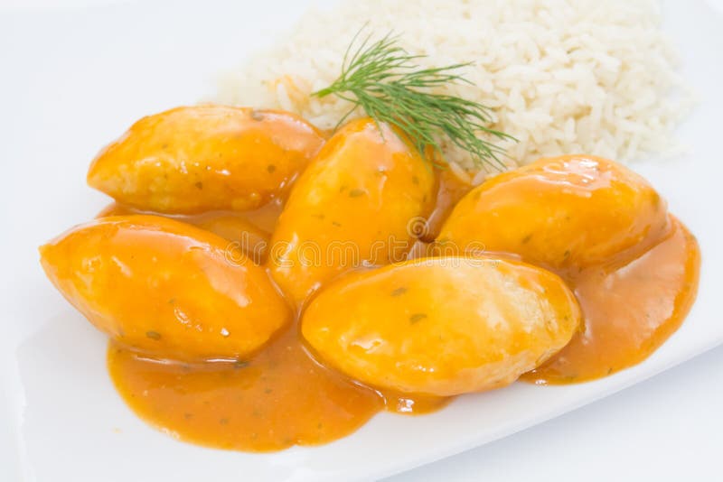 Pike Quenelles with Nantua Sauce and Rice Stock Image - Image of fish ...
