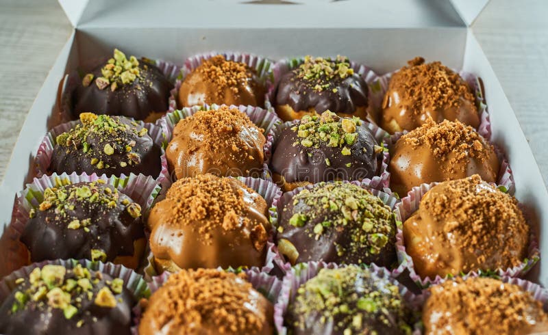 Plate of Profiterole with Different Sort of Flavored Dressings Stock ...