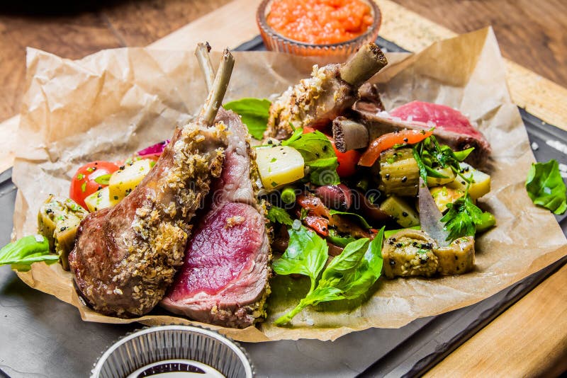 A Plate of Rack of Lamb on a Table Stock Image - Image of eating ...