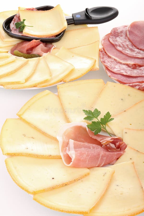 Plate of raclette cheese stock photo. Image of gastronomy - 18705300