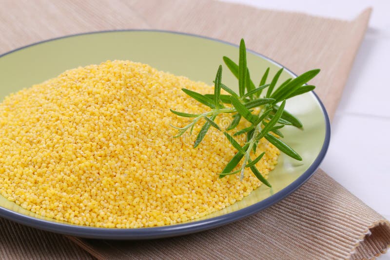 Plate of raw millet stock photo. Image of food, green - 97908706