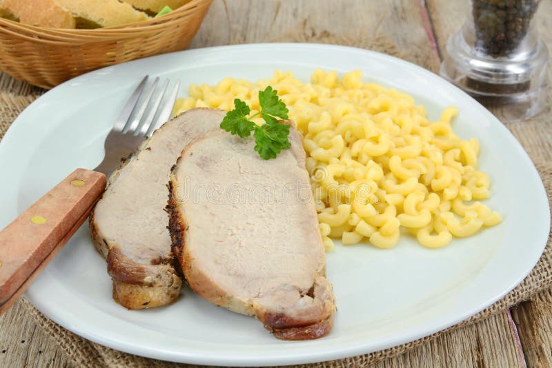 Roast pork and pasta stock image. Image of slices, shells - 163738669
