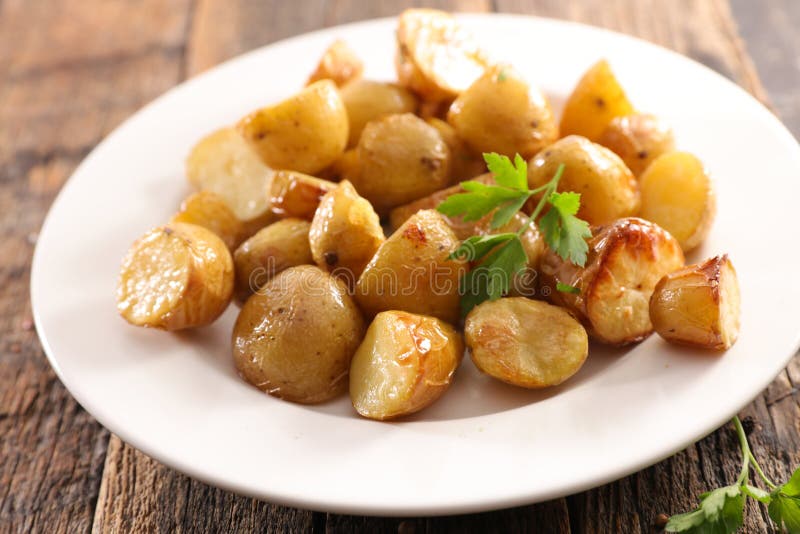 Plate of roasted potato stock photo. Image of vegetable - 121476788