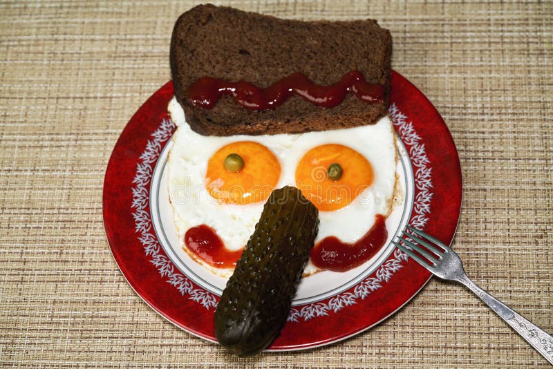 On a Plate are Scrambled Eggs in the Shape of a Face. Funny Breakfast ...