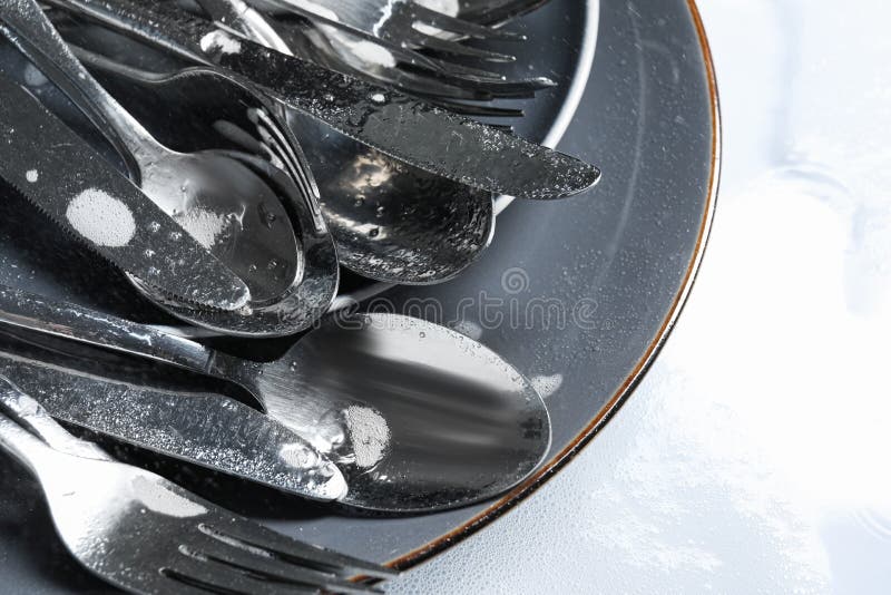 Plate with Silverware in Foam, Above View Stock Photo - Image of spoons ...