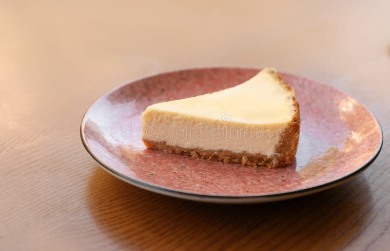 Plate with Slice of Cheesecake on Table Stock Photo - Image of bake ...