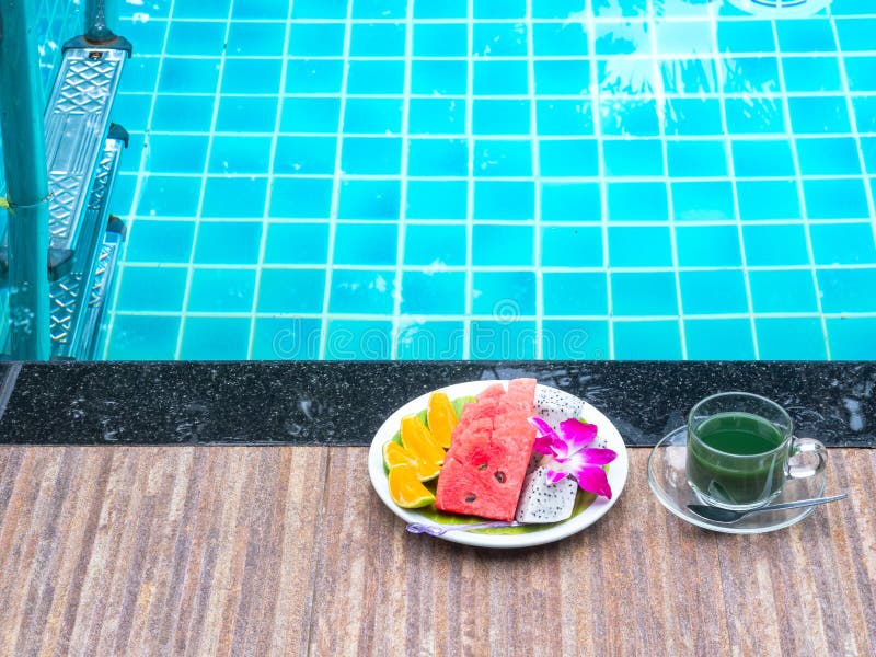 Fruit and Tea on Side of Pool Stock Photo - Image of inside, side ...
