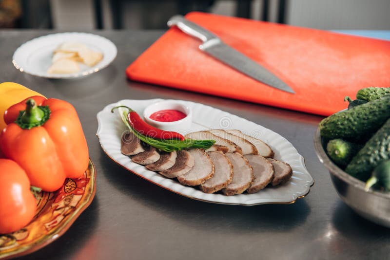 Sliced Meat and Various on Table at Restaurant Kitchen Stock Photo ...