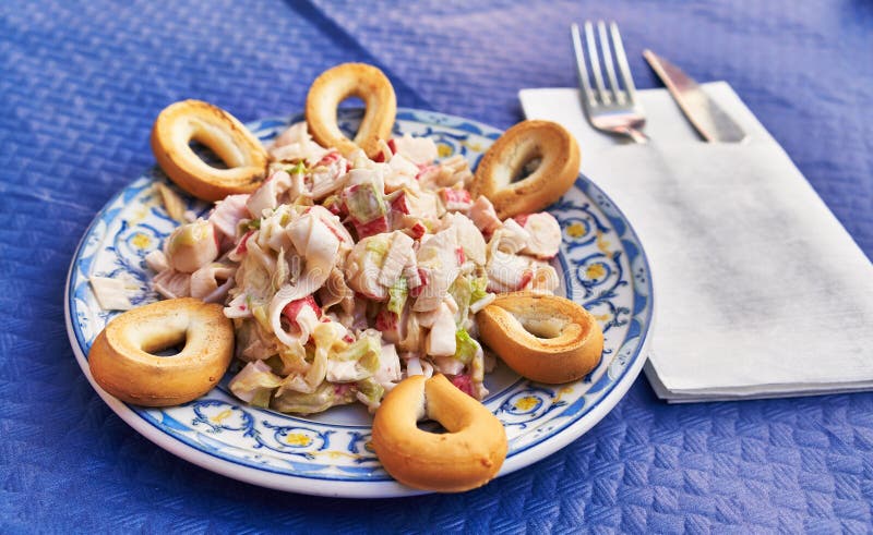 Plate of Spanish Salad on Paper Surface Stock Image - Image of table ...