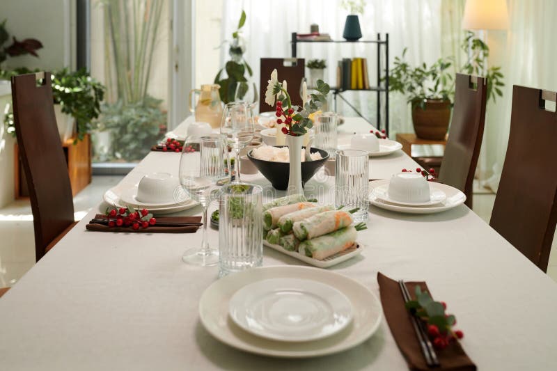Plate with Spring Rolls on Dinner Table Stock Photo - Image of event ...