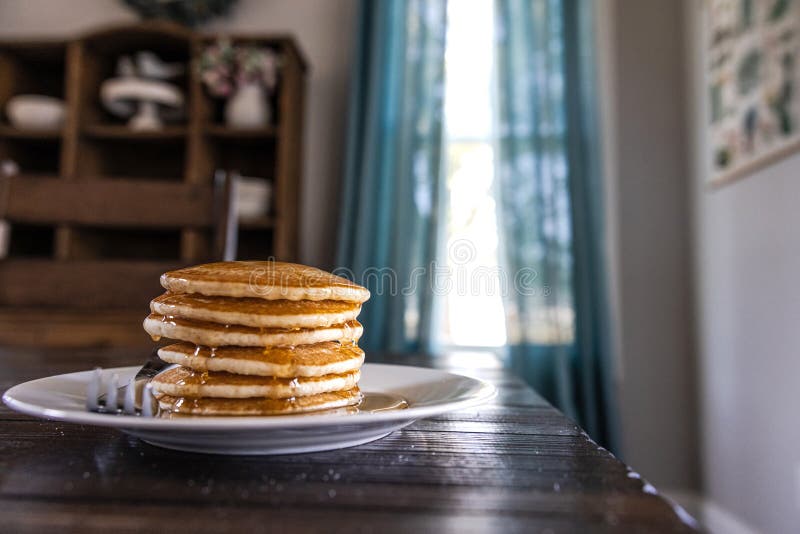 A Plate with a Stack of Homemade Pancakes at a Dark Wood Kitchen Dining ...