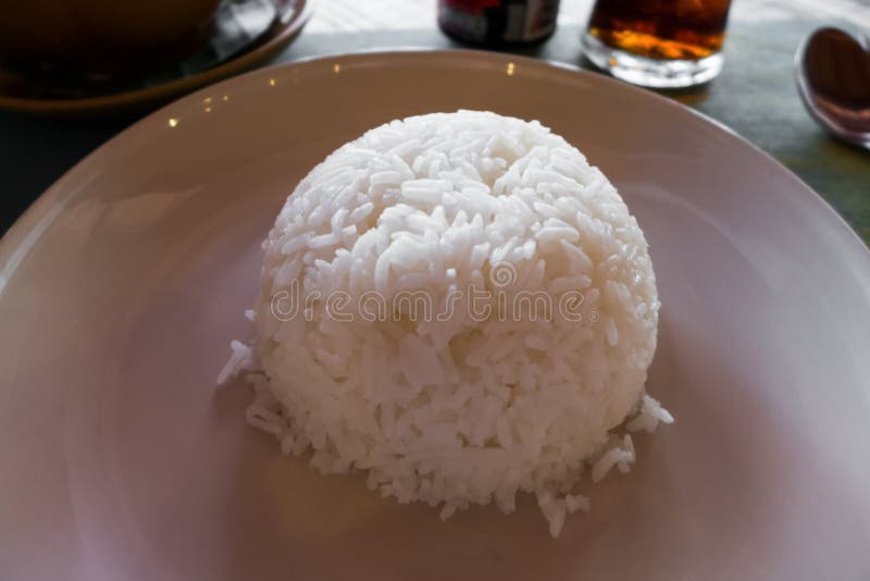 A plate with steamed rice stock photo. Image of vacation - 152681430
