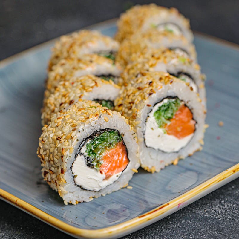 Plate of Sushi on Table stock image. Image of japanese - 306676201