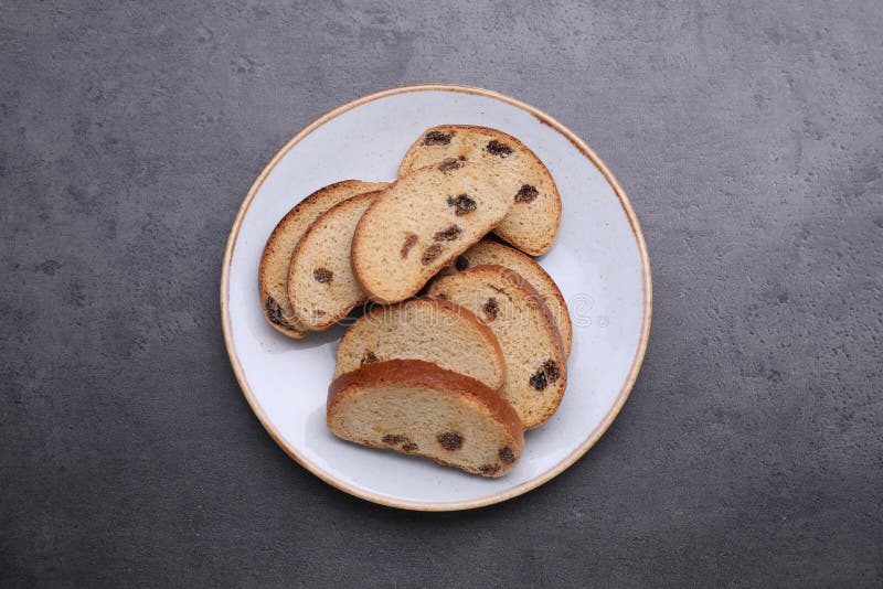 Plate of Sweet Hard Chuck Crackers with Raisins on Grey Table, Top View ...