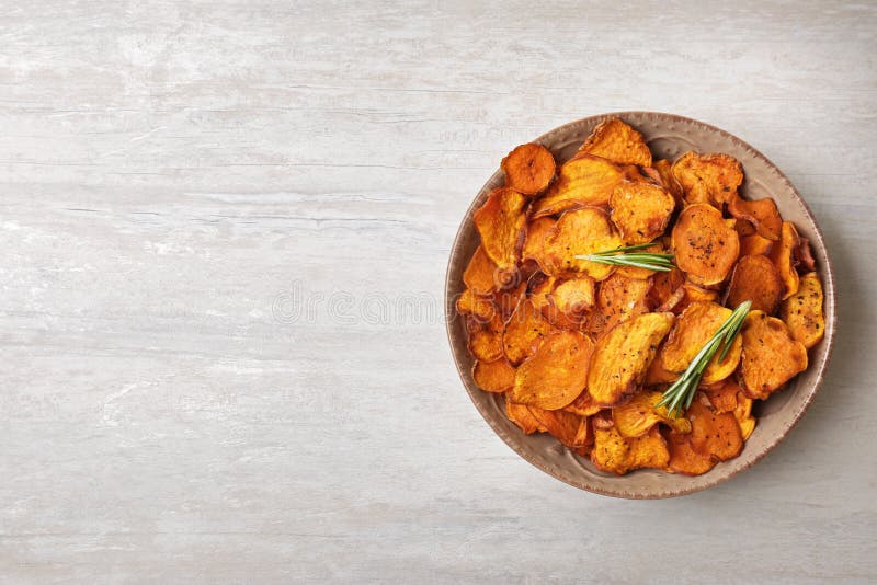 Plate of Sweet Potato Chips on Light Table, Top View Stock Image ...