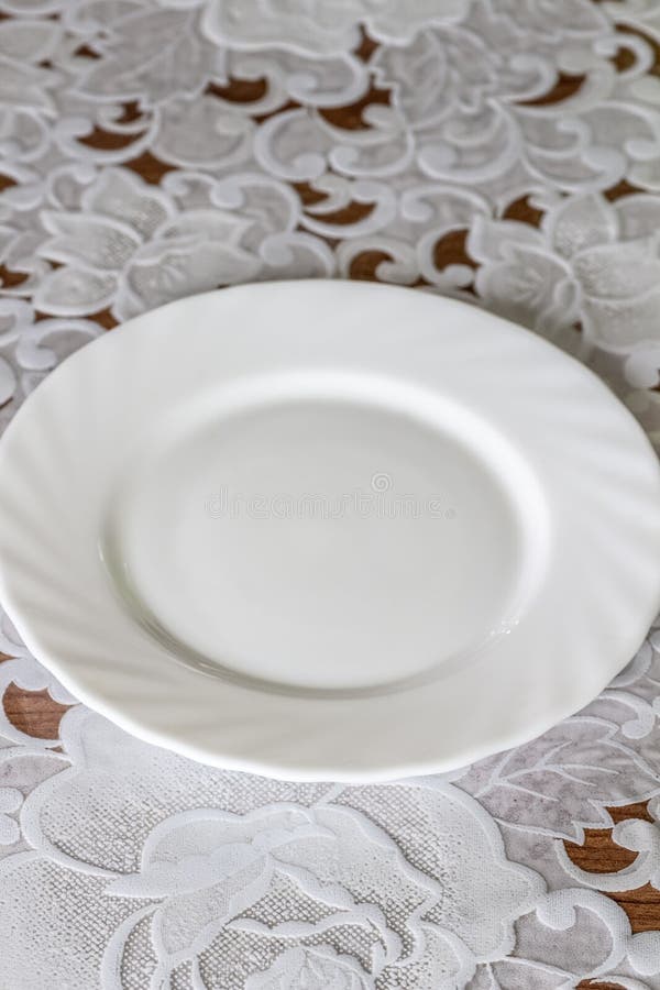 Plate on the table stock photo. Image of kitchen, cookware - 197948466