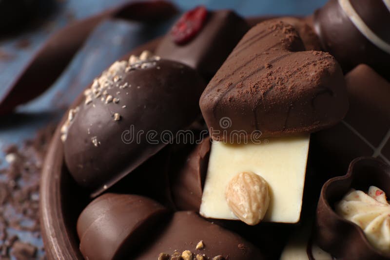 Plate with Tasty Chocolate Candies, Closeup Stock Image - Image of ...