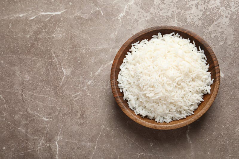 Plate of Tasty Cooked Rice on Color Background, Top View Stock Photo ...