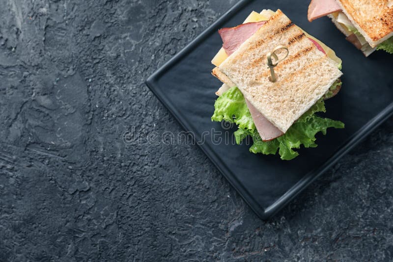 Plate with Tasty Sandwich on Textured Table Stock Image - Image of ...