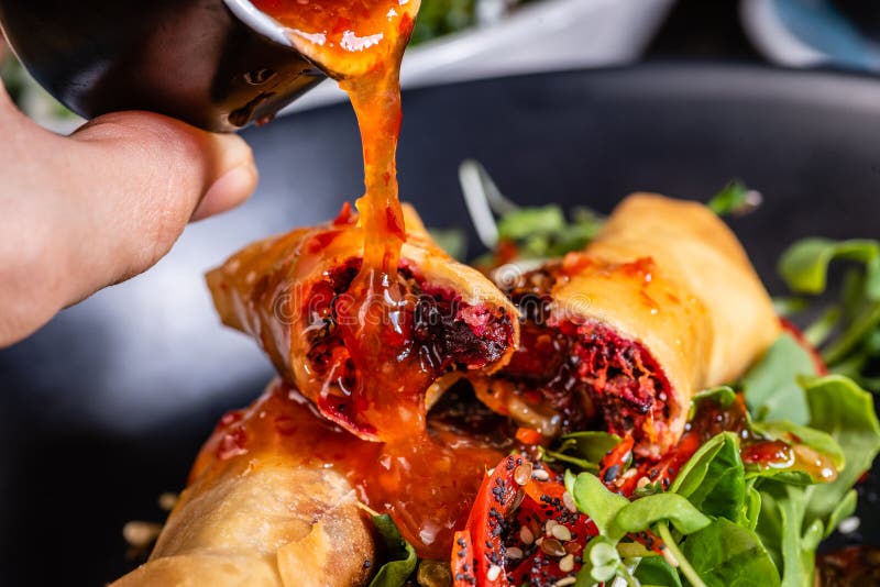 A Plate of Three Spring Rolls Stock Image - Image of appetizer, cooking ...