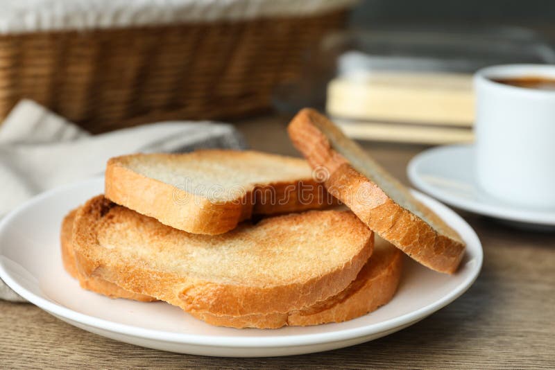 Plate with Toasted Bread on Wooden Table Stock Image - Image of crust ...