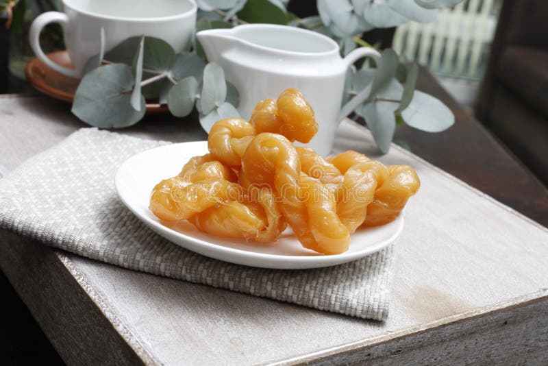 Plate of koeksisters stock photo. Image of coffee, treat - 219604484