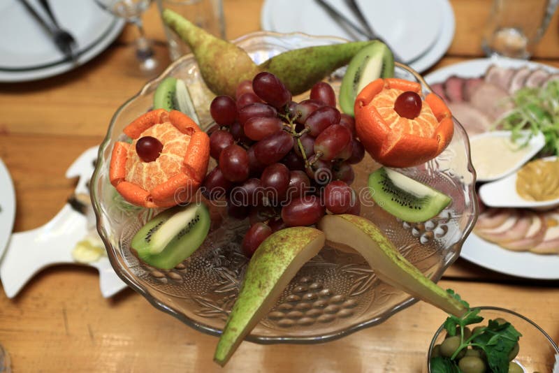 Plate with various fruits stock photo. Image of mixing - 69632700